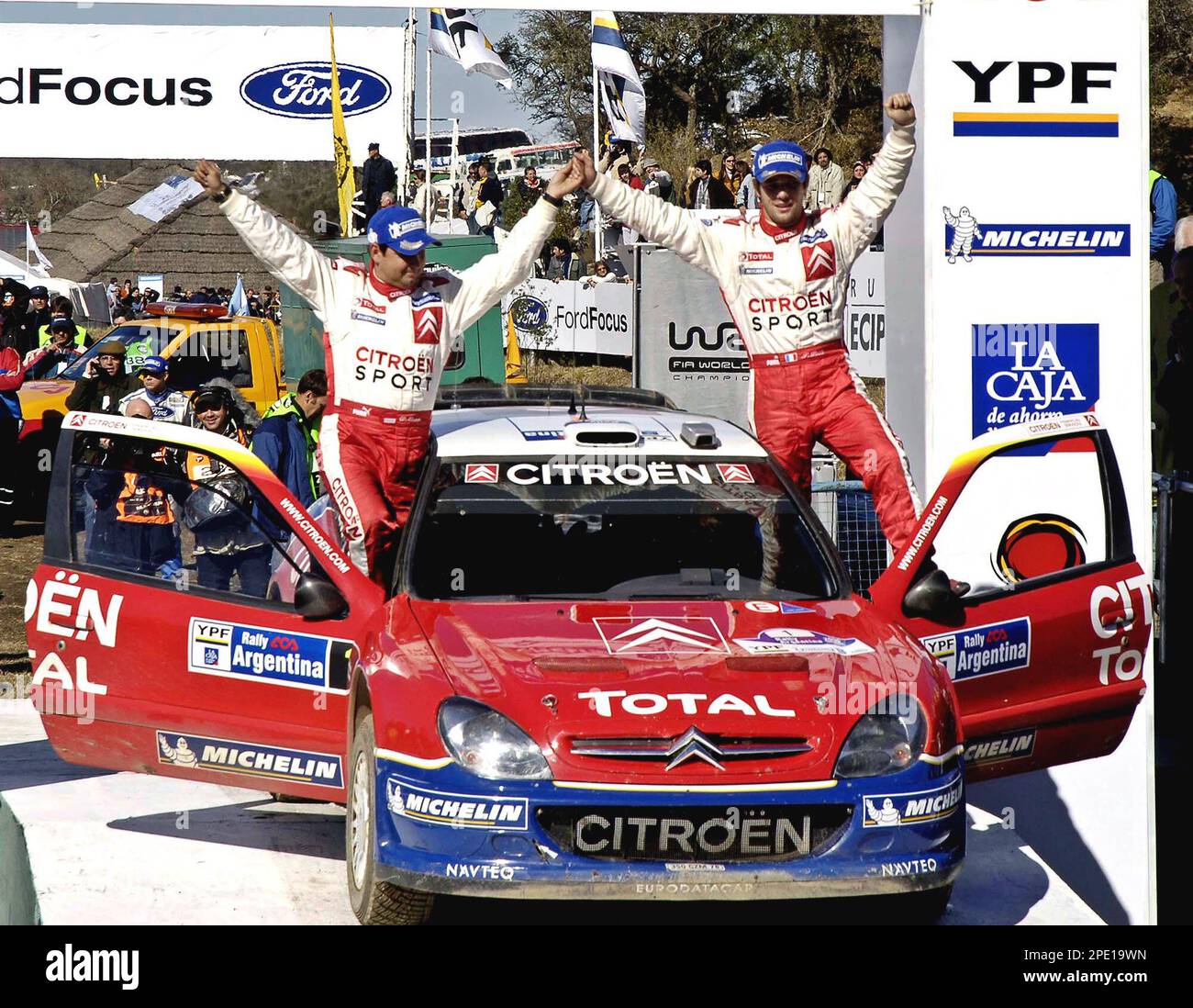 Leading World Rally Championship, France's Sebastien Loeb, right, with ...