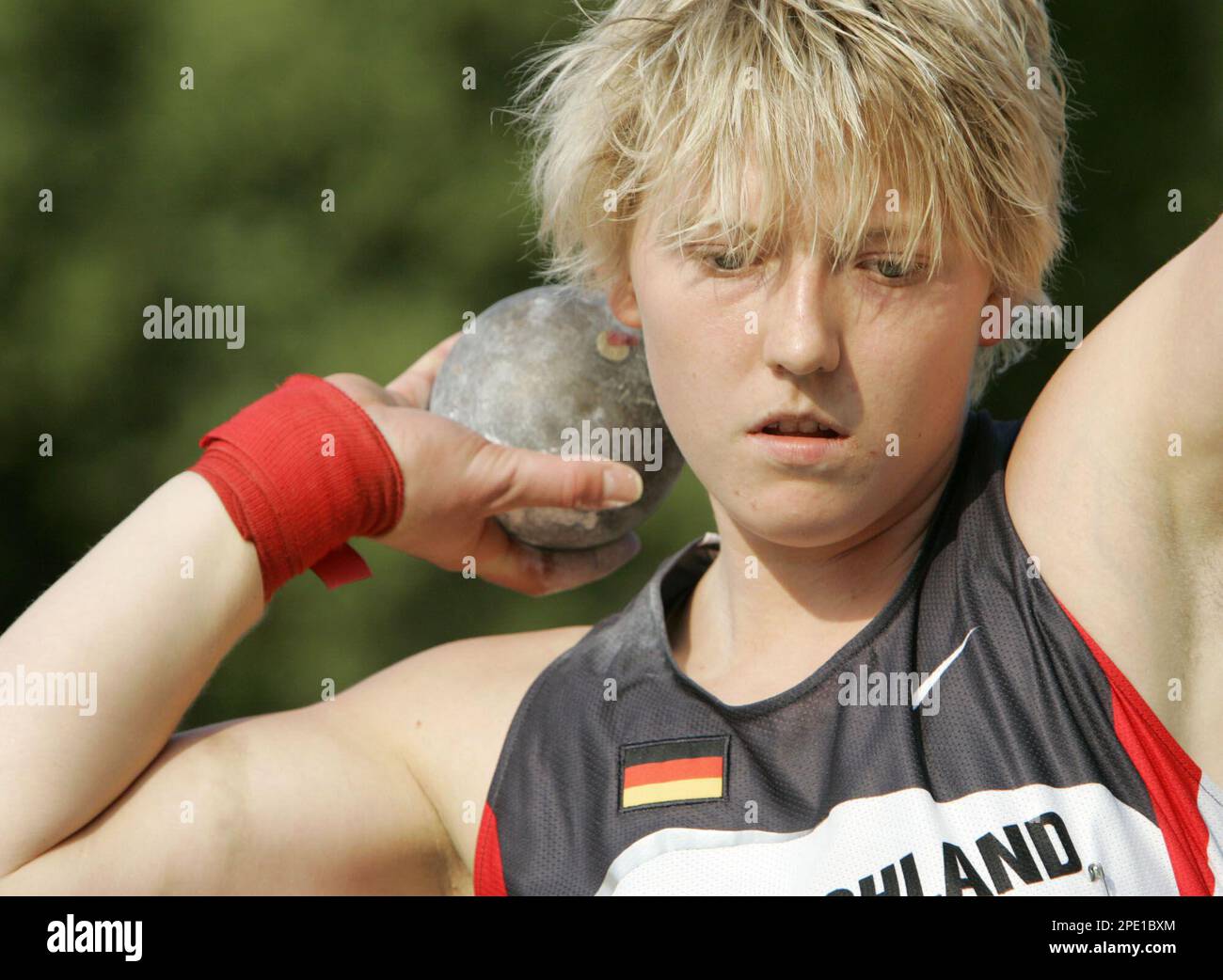 Germany's Petra Lammert concentrates during the women's shot put ...