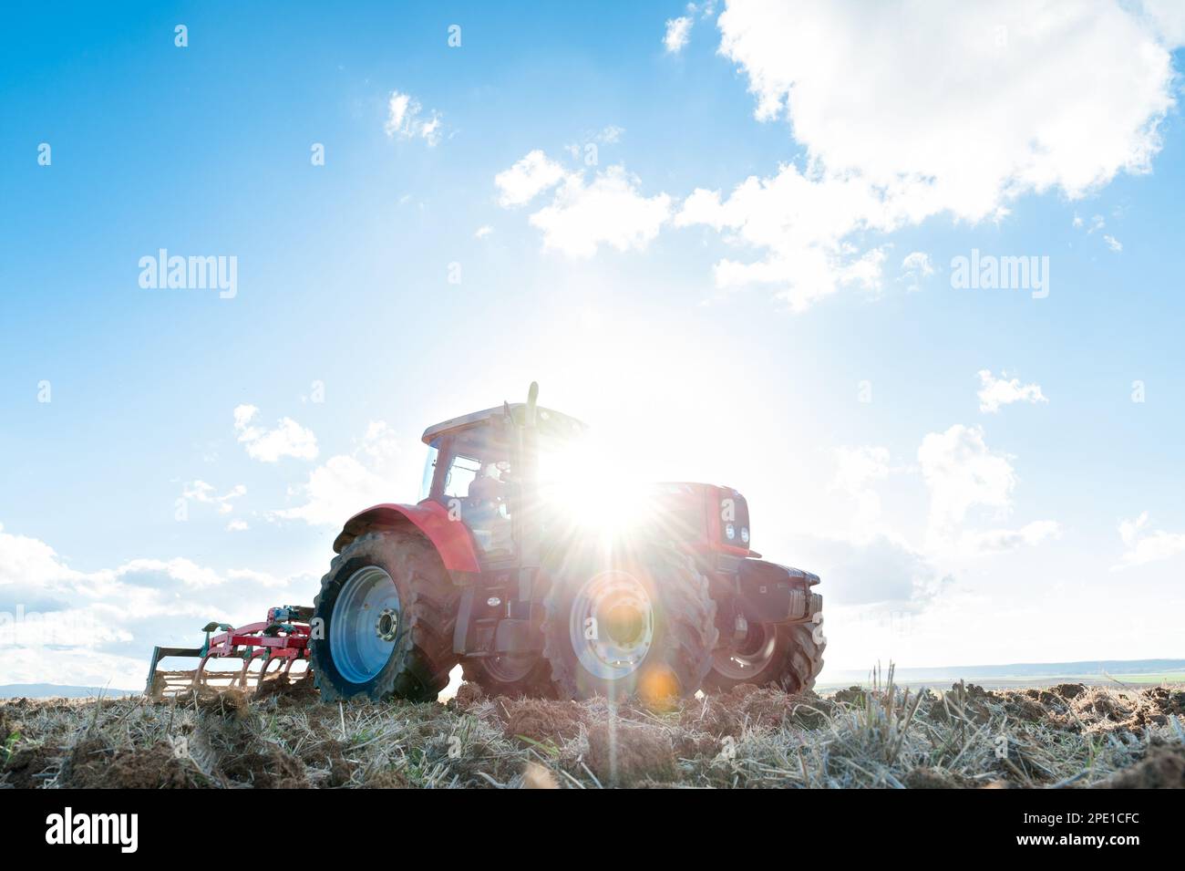 agricultural machinery working the land in the field Stock Photo - Alamy