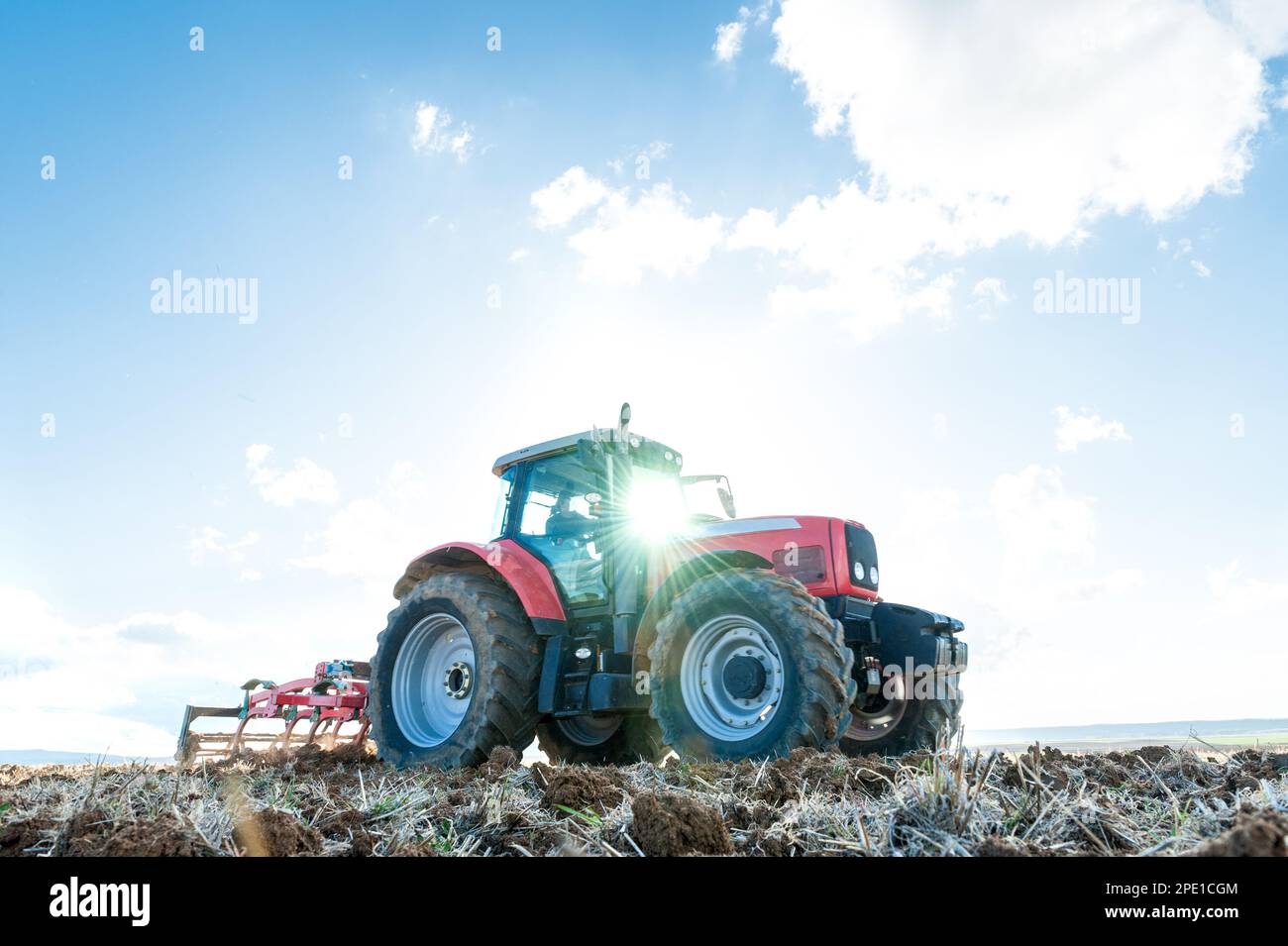 agricultural machinery working the land in the field Stock Photo - Alamy