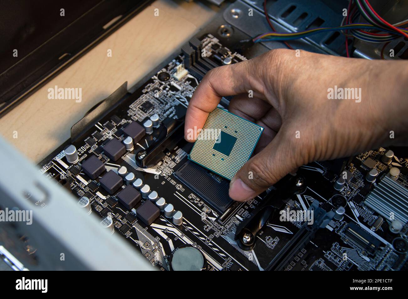 Inserting cpu hi-res stock photography and images - Alamy