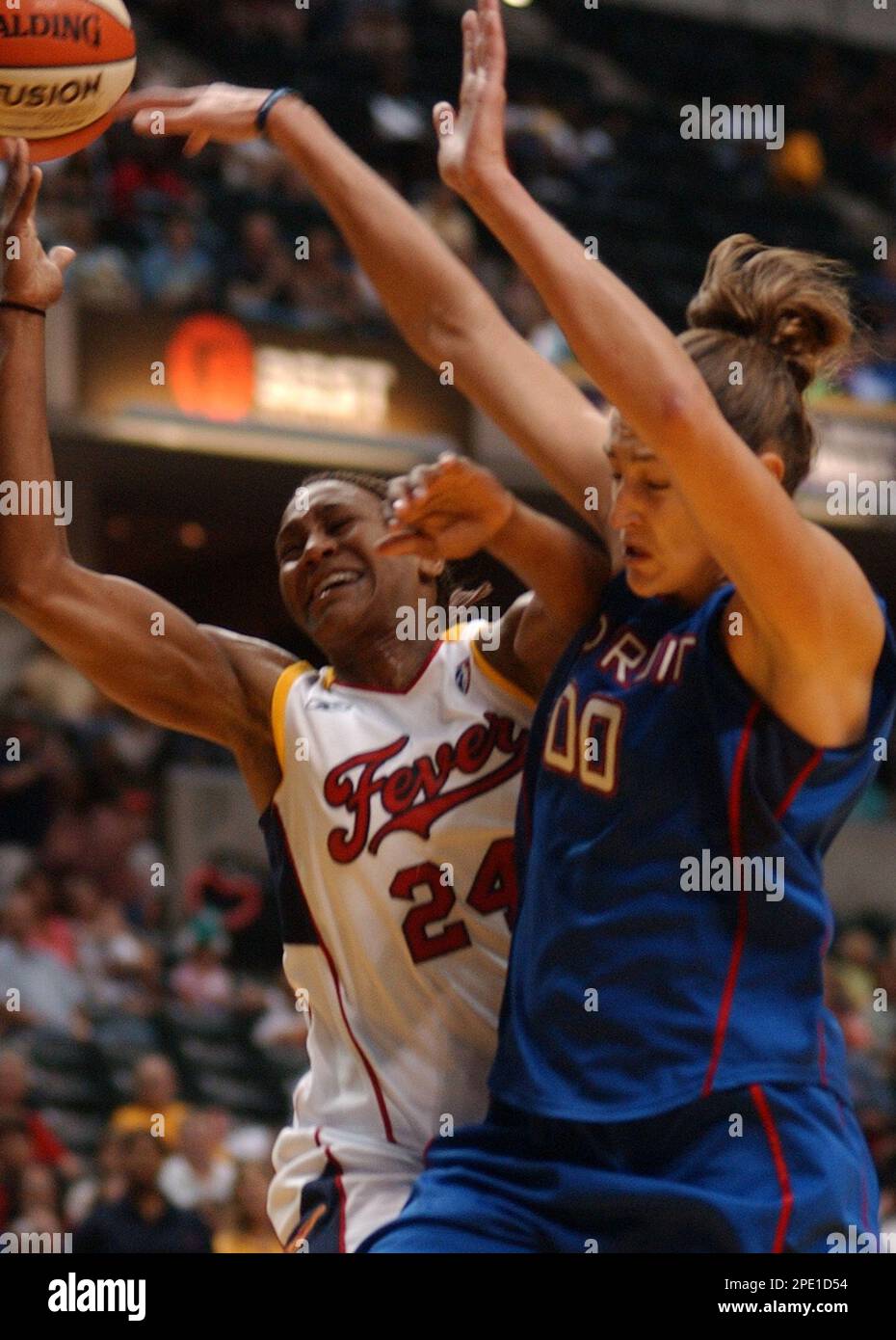 Indiana Fever's Tamika Catchings (24) has the ball knocked away by ...