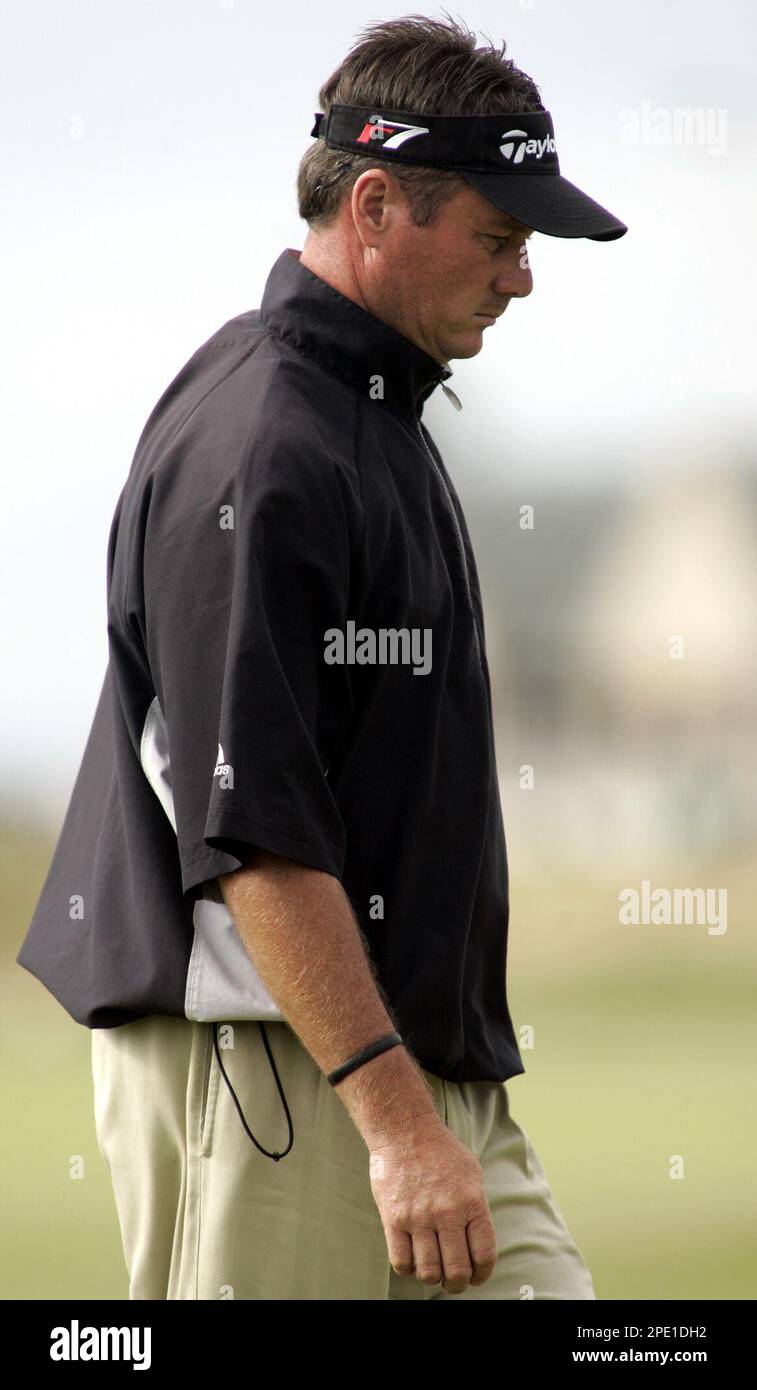 Defending champion Todd Hamilton walks from from the 18th tee during ...