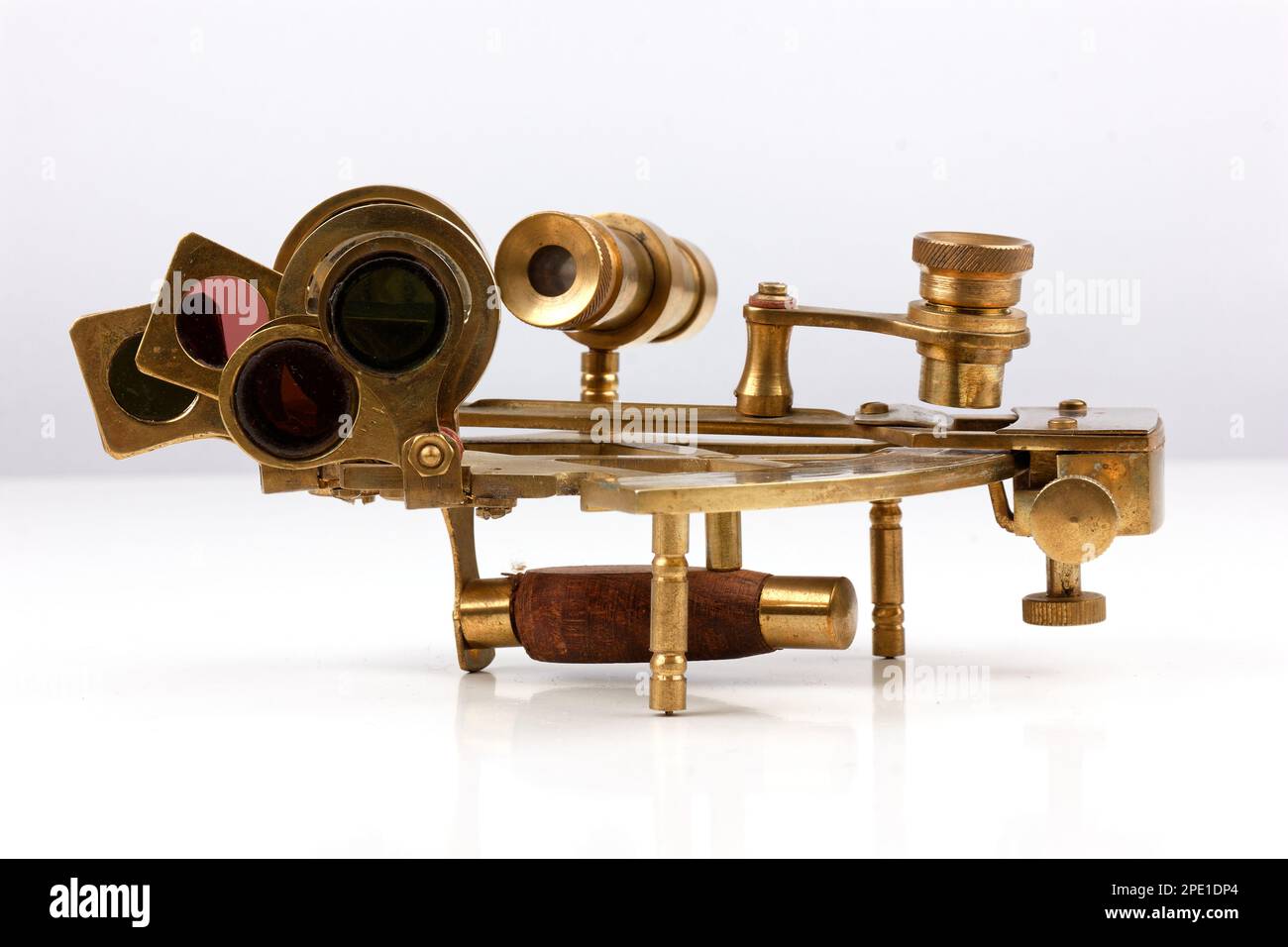 detailed view of a old nautical sextant with optics isolated on white ...