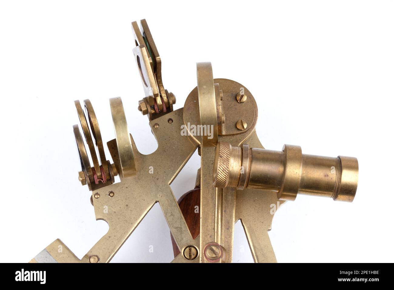 detailed view of a old nautical sextant with optics isolated on white ...