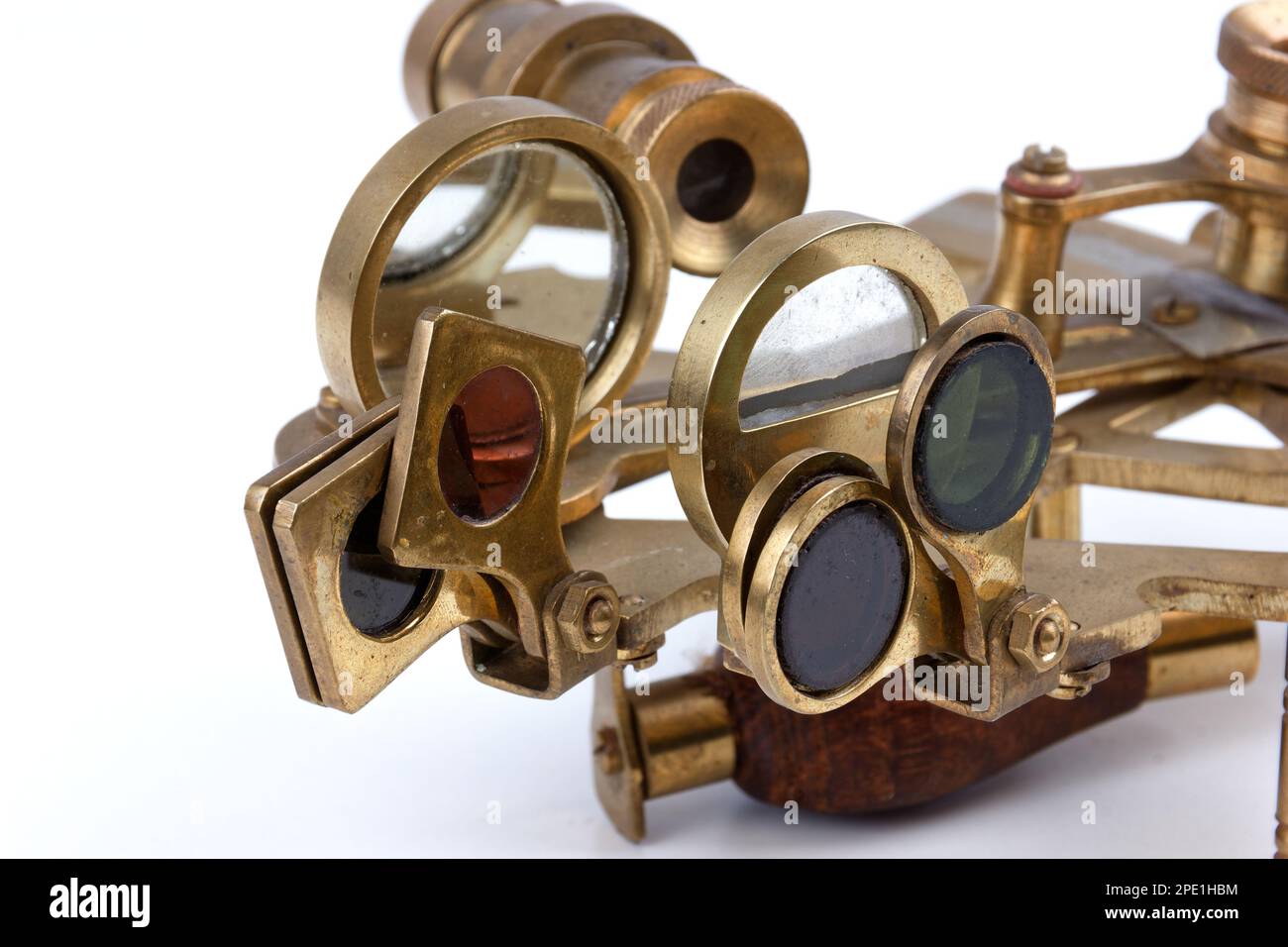 detailed view of a old nautical sextant with optics isolated on white ...