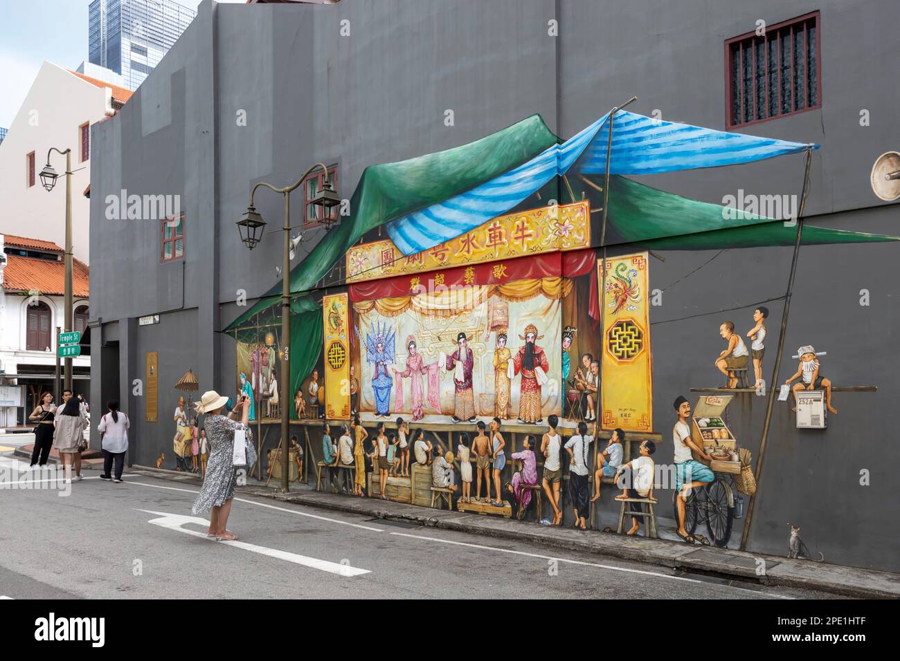 Artwork on walls in Chinatown, Singapore by street artist Yip Yew ...