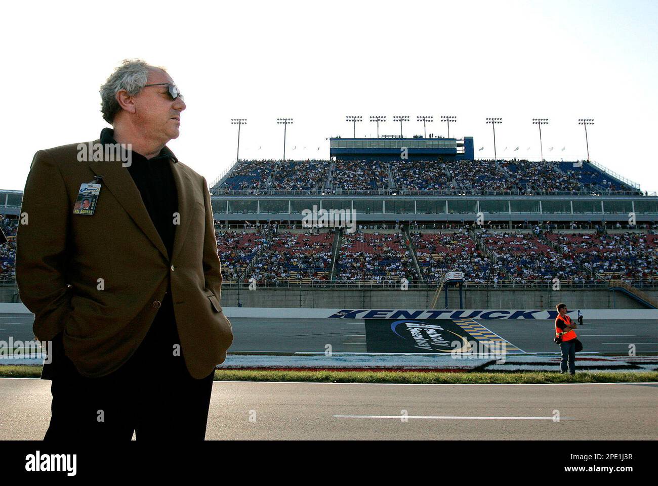 Kentucky Speedway owner Jerry Carroll waits in front of the grandstand ...