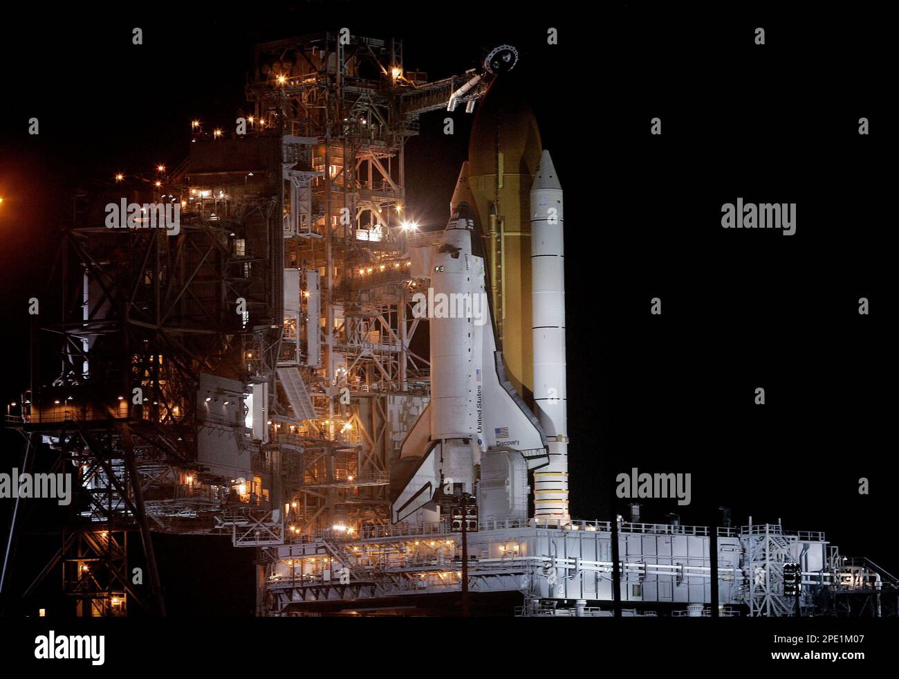 The Space Shuttle Discovery sits on the launch pad after the Rotating ...