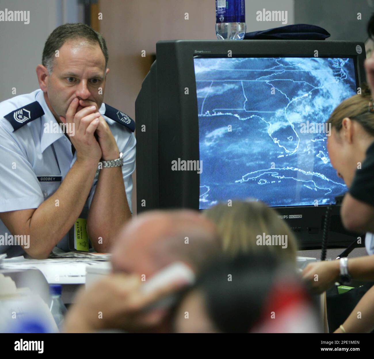USAF MSgt Kelly Godbey checks the activity around the Air Force weather ...