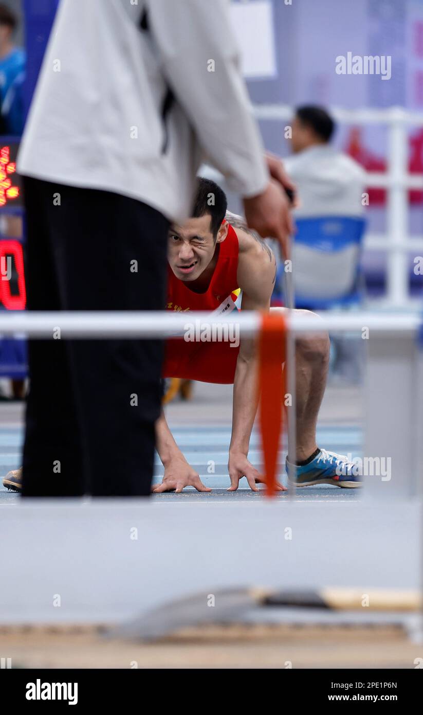 Tianjin. 15th Mar, 2023. Gao Xinglong reacts during the men's long jump final of 2023 Chinese ...