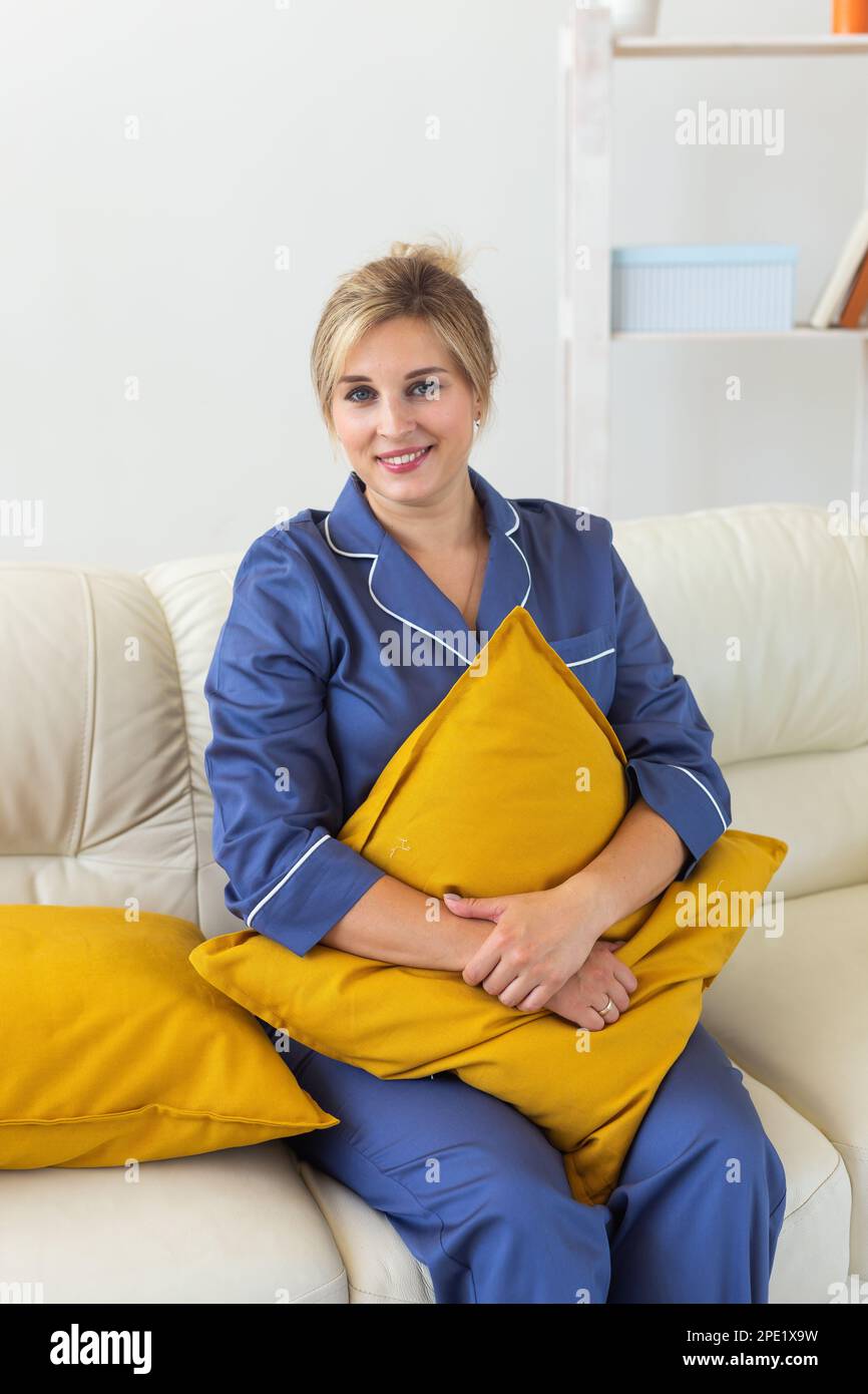 Glamorous woman wears pajama with happy smile chilling in good morning ...