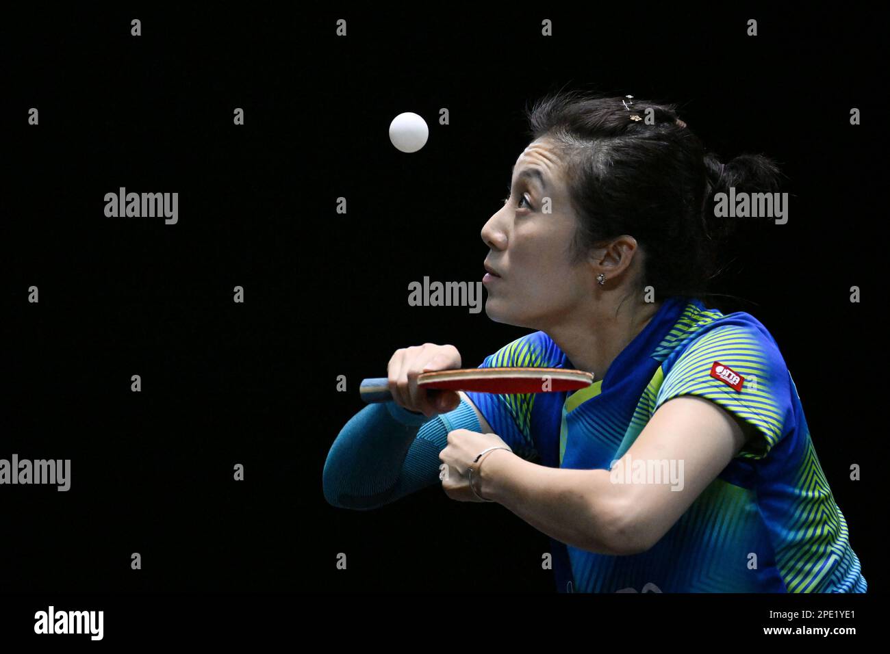 Singapore. 15th Mar, 2023. Han Ying of Germany serves during the women ...