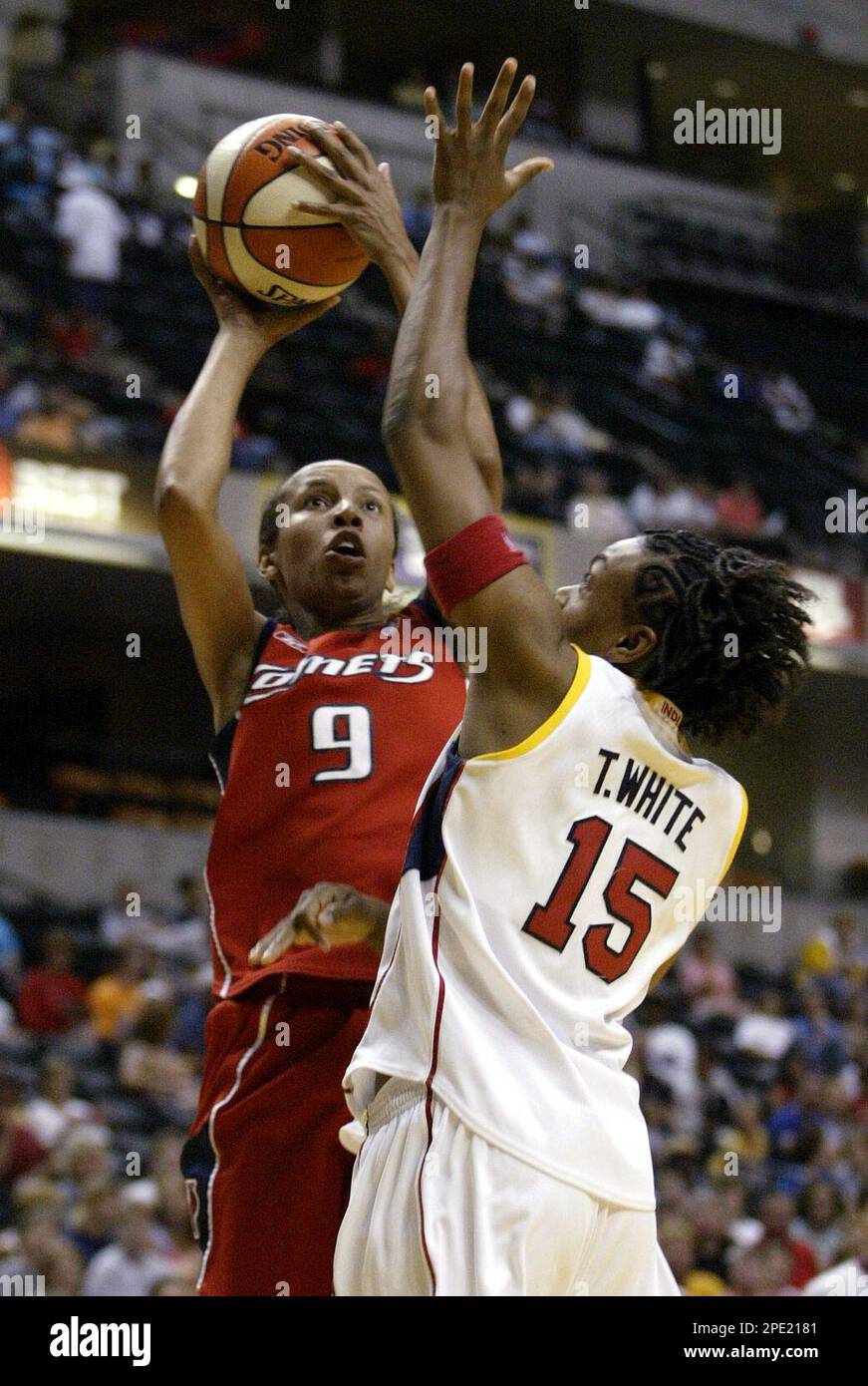 Houston's Janeth Arcain (9) of Brazil, shoots over Indiana's Tan White ...
