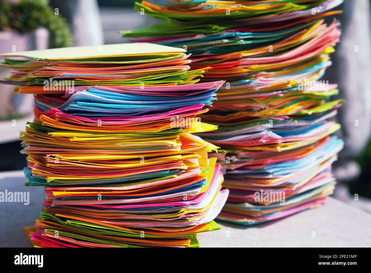 Multicolor memo notes with tasks stored chaotically in 2 stacks. Work ...