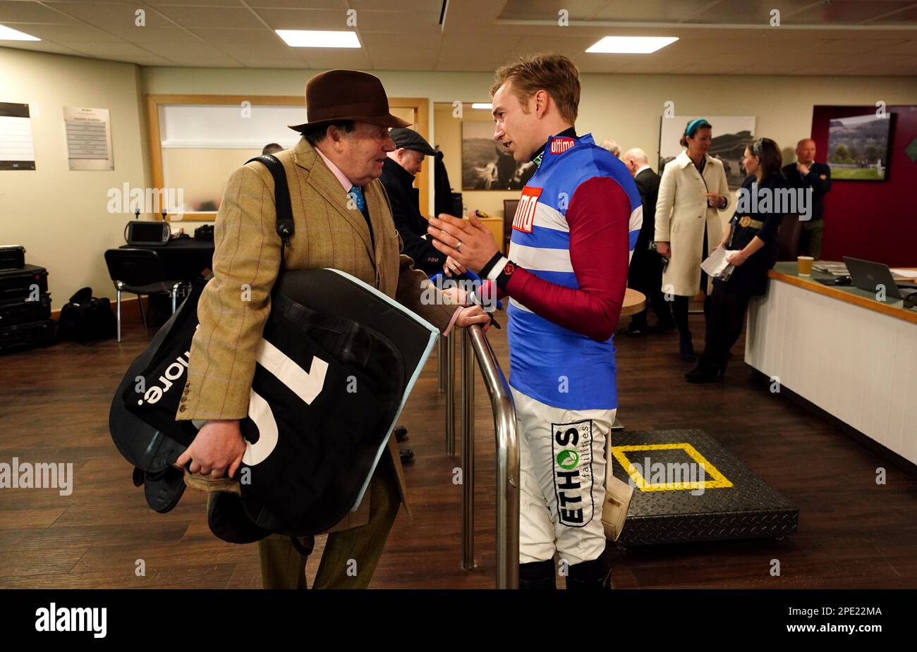 Trainer Nicky Henderson with jockey Adrian Heskin in the weighing room ...