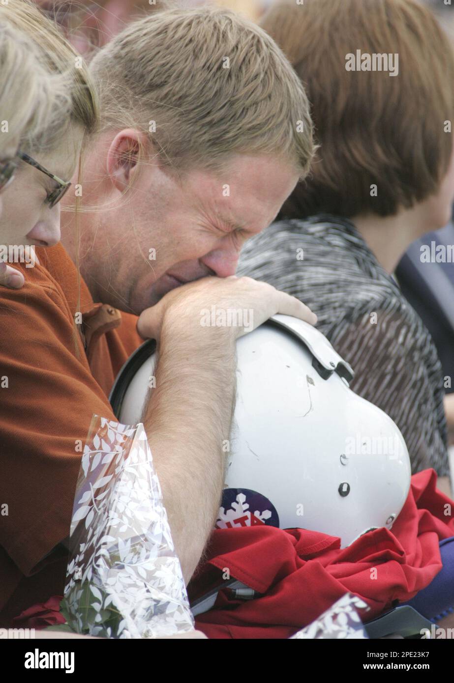 Rob Hyslop holds the flight helmet that belonged to his late brother ...