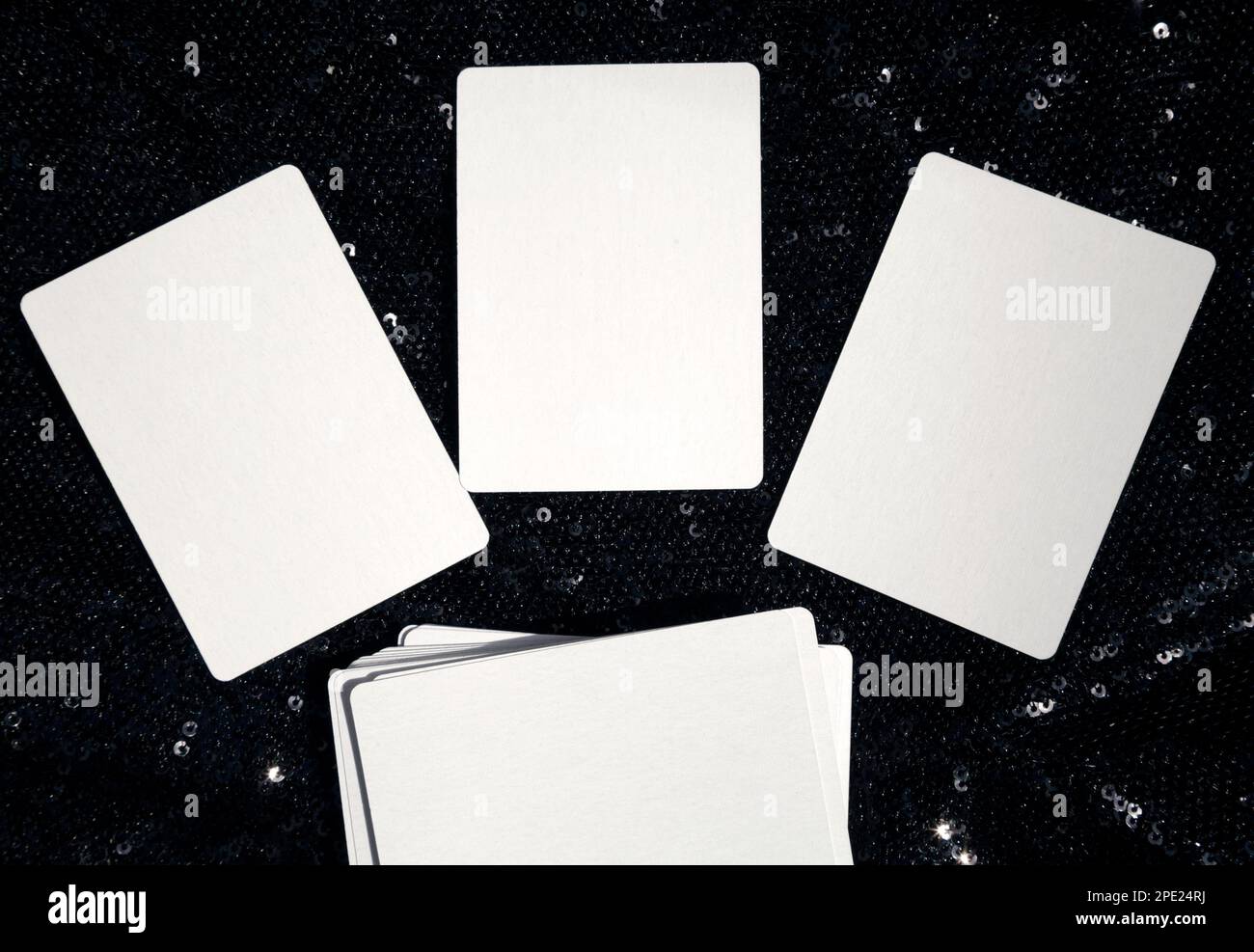 Mockup of 3 blank white tarot cards or learning cards and a deck with ...