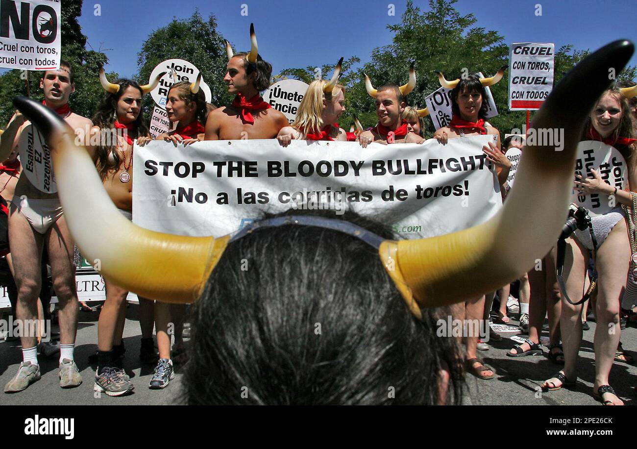Anti-bullfight protesters gather a day before the annual San Fermin ...
