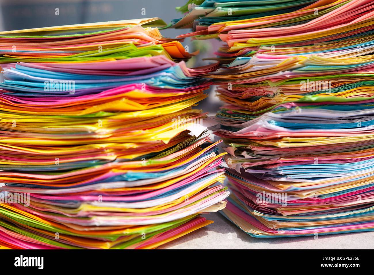 Colorful memo notes with tasks stored chaotically in 2 stacks. Work ...