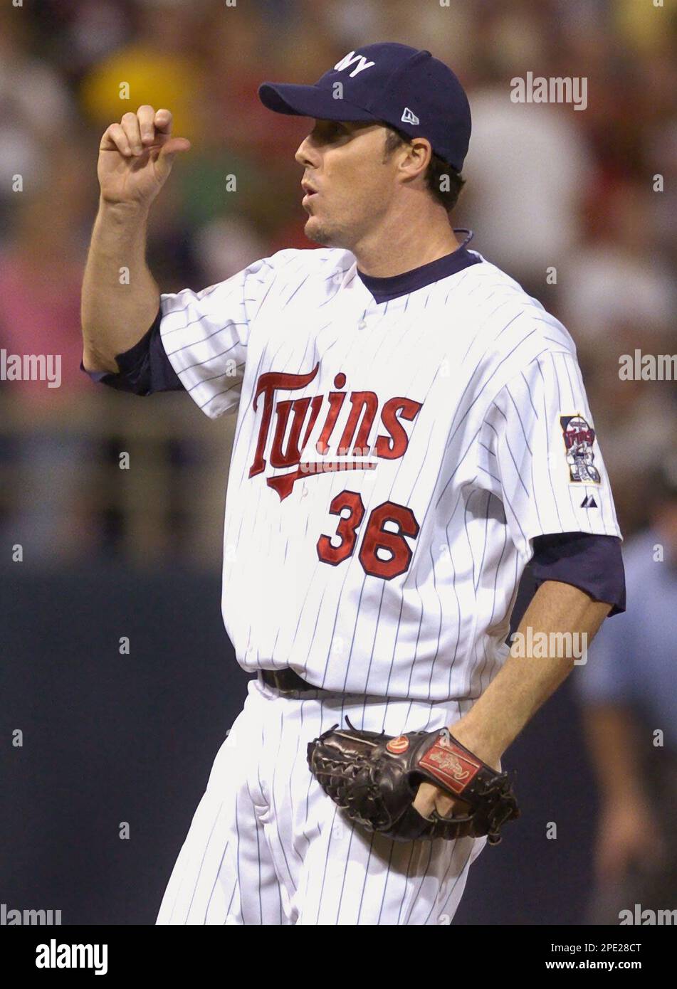 Minnesota Twins' Joe Nathan reacts after getting a close call from home ...
