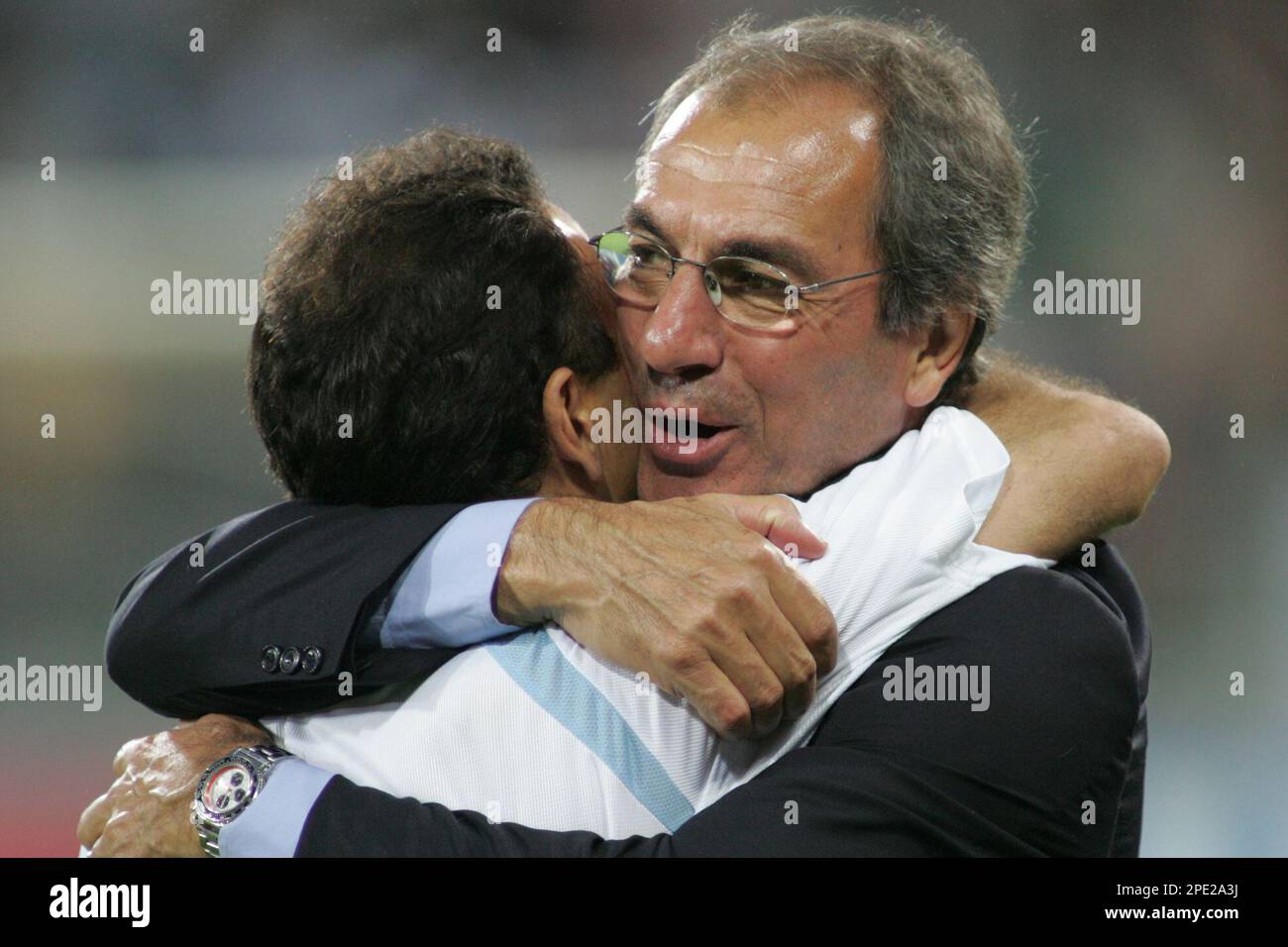 Argentina's Lionel Messi celebrates with coach Francisco Ferraro after ...