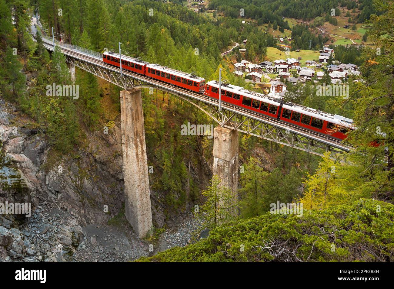 Zermatt, Switzerland Gornergrat red tourist train on the bridge ...