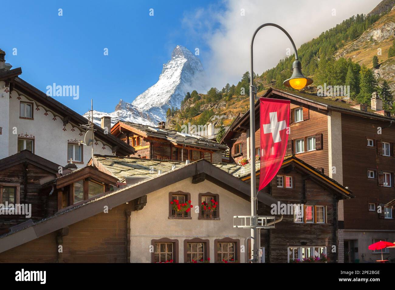 Matterhorn snow mount close-up and Zermatt alpine houses, Switzerland ...