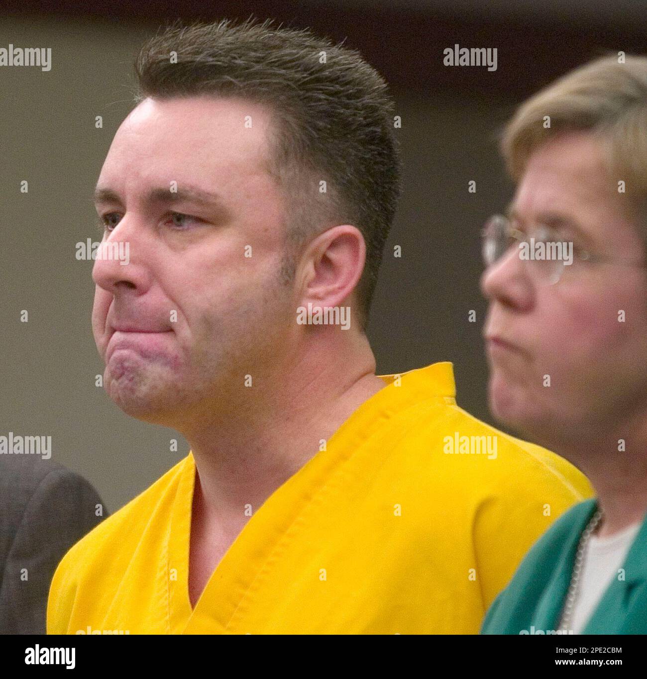 Brian Sullivan listens to Judge J. Dennis Frederick during his change ...