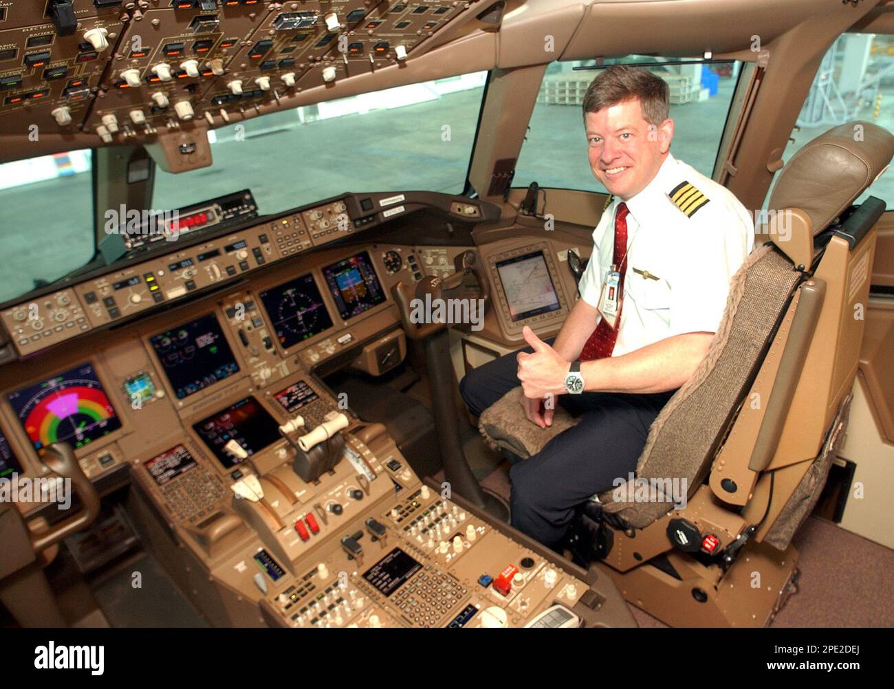 Boeing's captain Mike Bryan gives a thumb up as he seats in the co ...