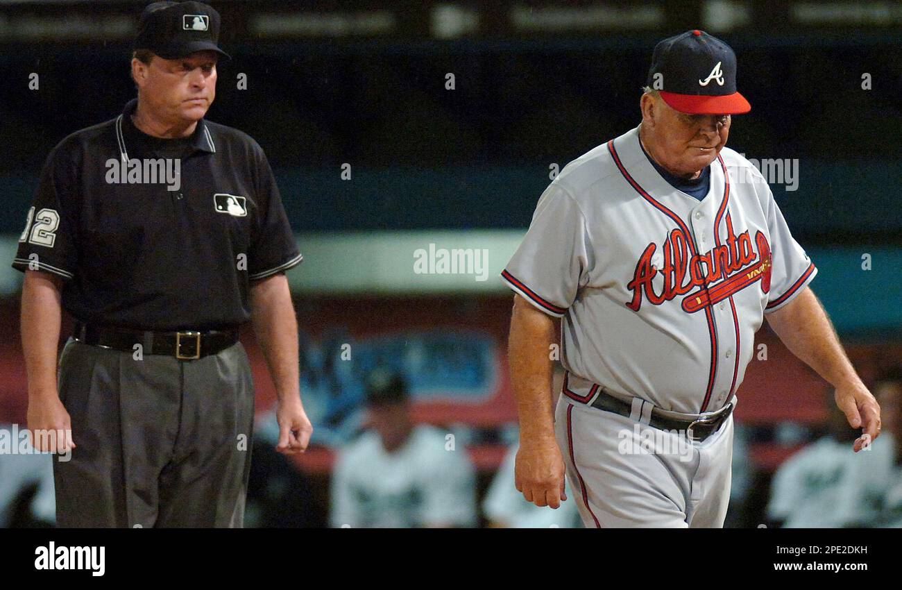 Atlanta Braves manager Bobby Cox heads to the dugout after being ...