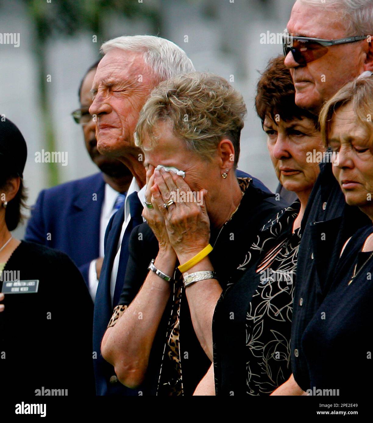 Stanley and Gaye Lapinski,center, the parents of Army Cpl. Stanley ...