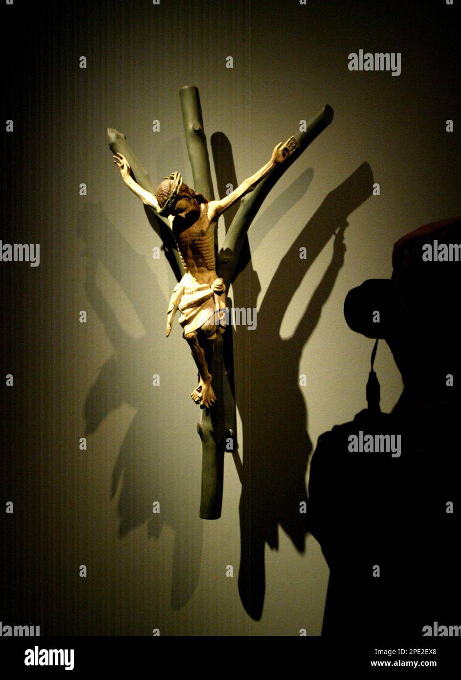 ** CORRECTS NAME OF MUSEUM ** Visitors takes photos of a "Fork crucifix ...