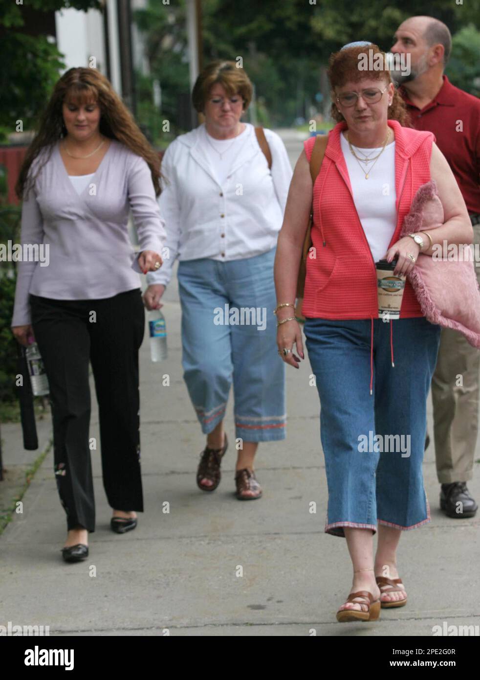 Terry King's sister Barbara Tuttle, front at right, and King's daughter ...
