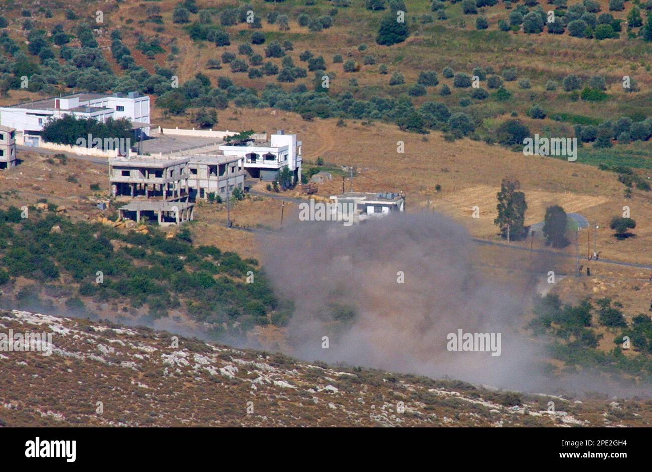 Smoke billows from the hill of Al-Mari village, near Chebaa Farms ...