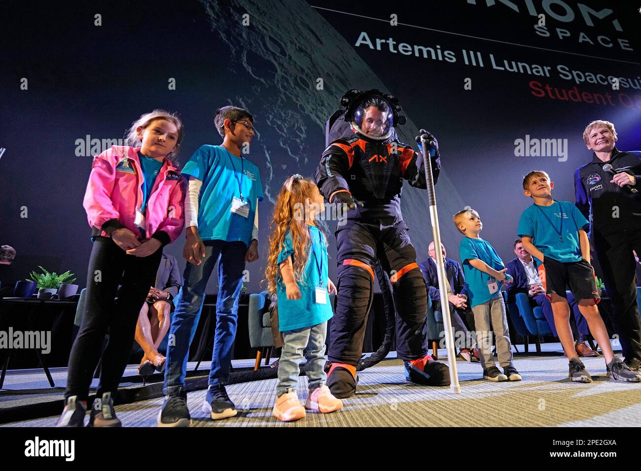 Axiom Space chief engineer Jim Stein, right, greets children during a ...