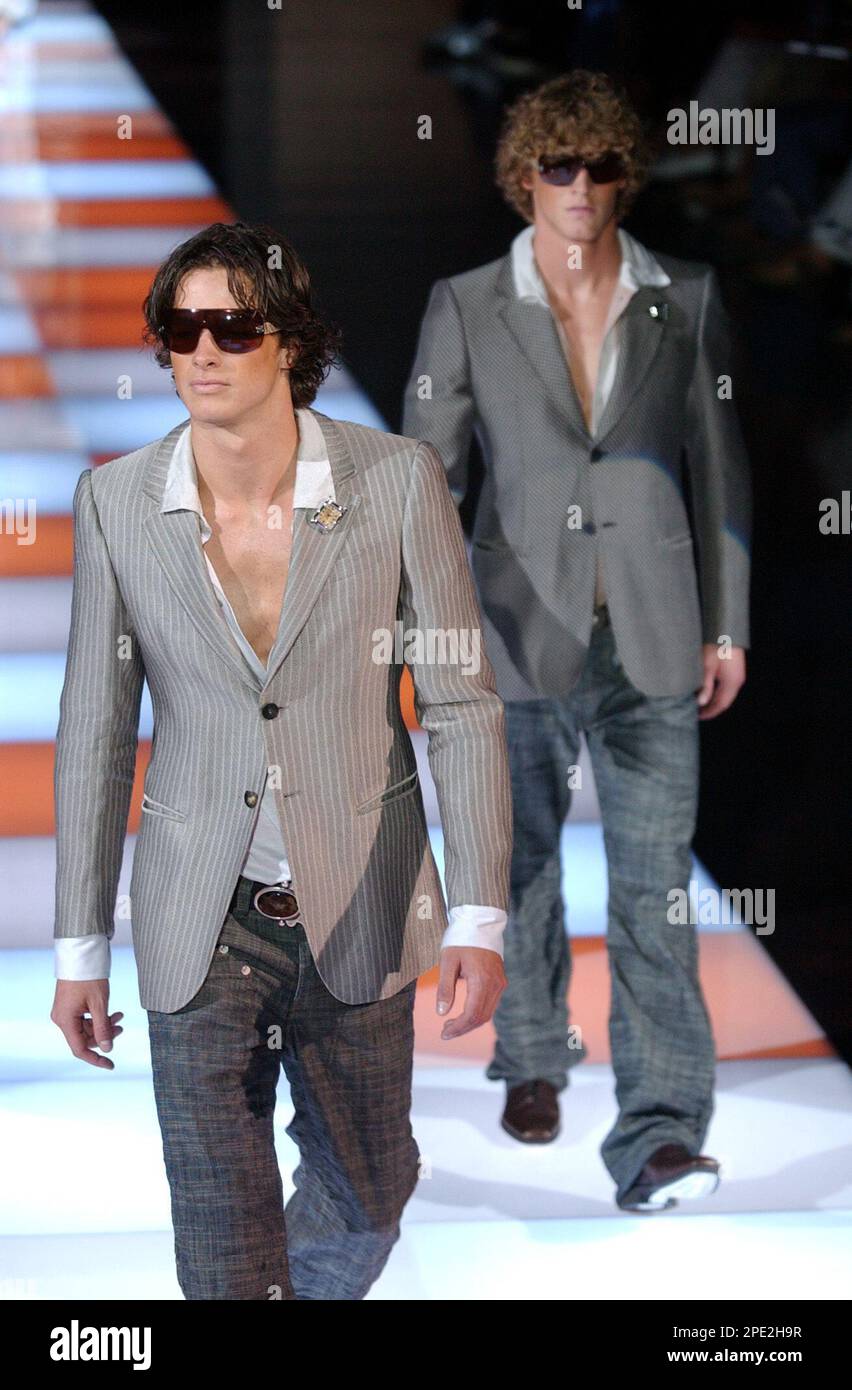 Models present creations as part of the Emporio Armani men's Spring ...