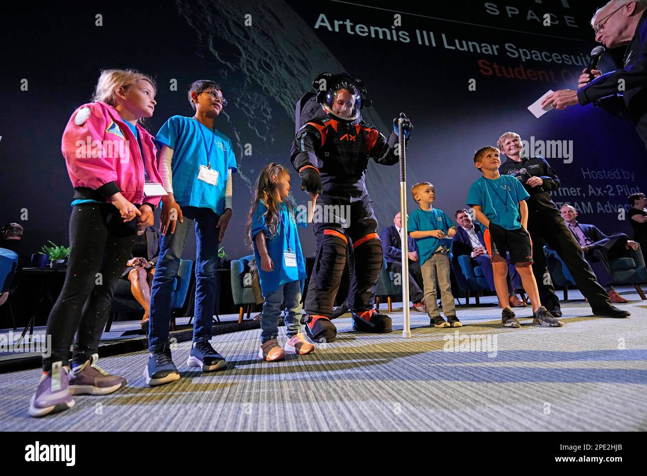 Axiom Space chief engineer Jim Stein, center, greets children during a ...