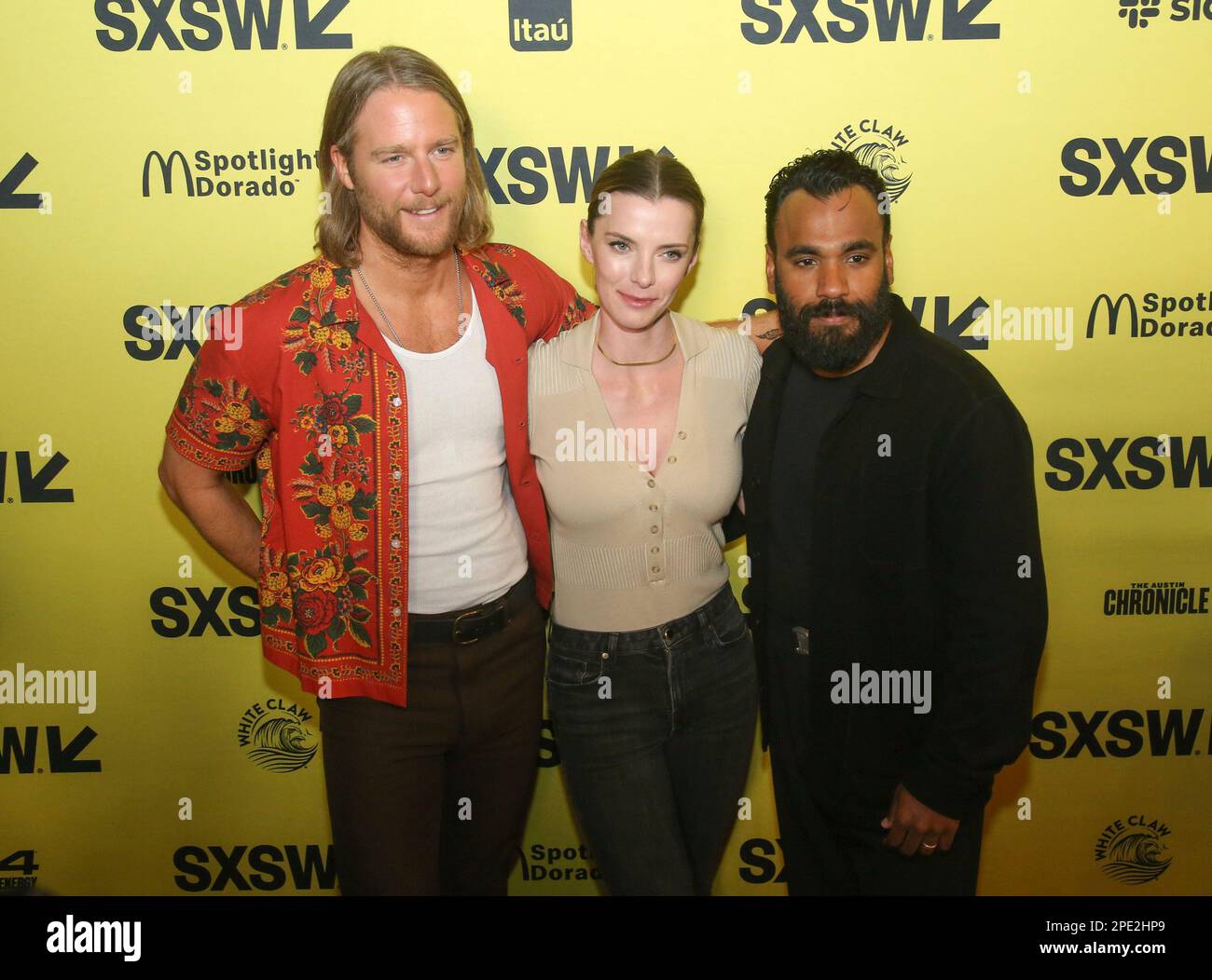 Jake McDorman, Betty Gilpin and Andy McQueen, from left, arrive for the ...