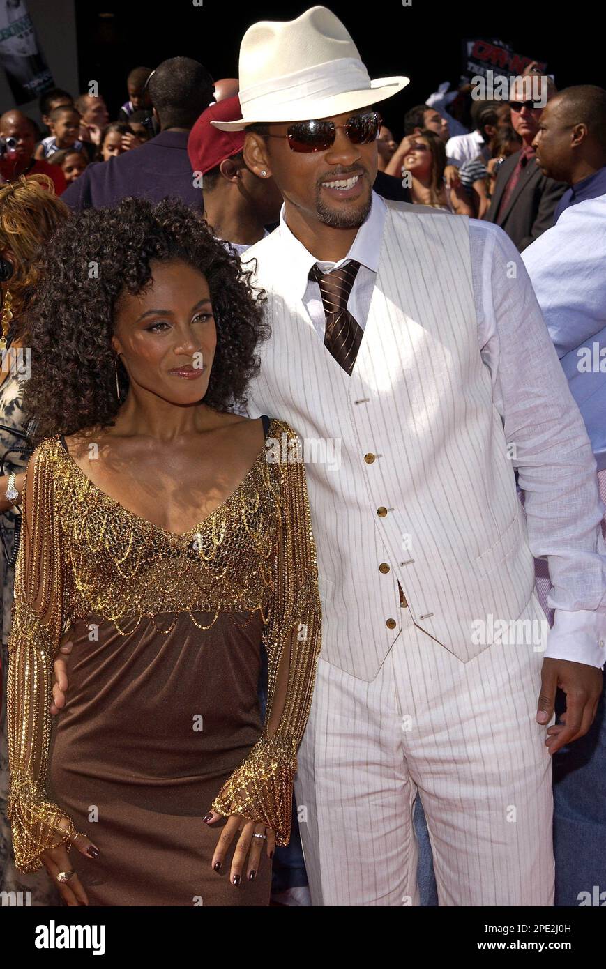 Hosts Will Smith, right, and wife Jada Pinkett Smith arrive for the 5th ...