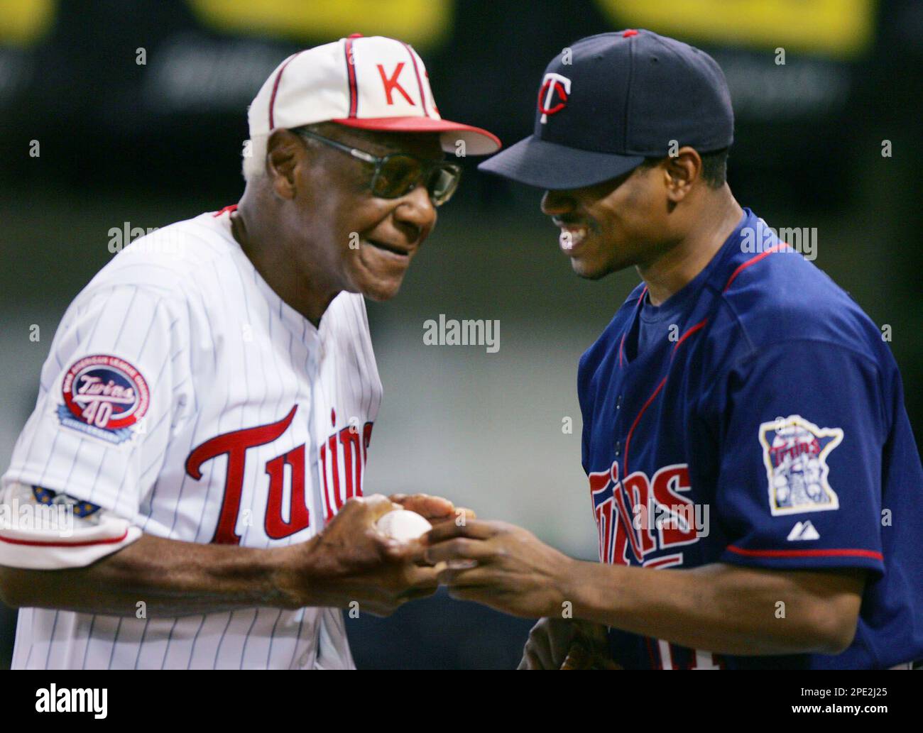 Minnesota Twins' Jacque Jones presents the ball after Negro League ...
