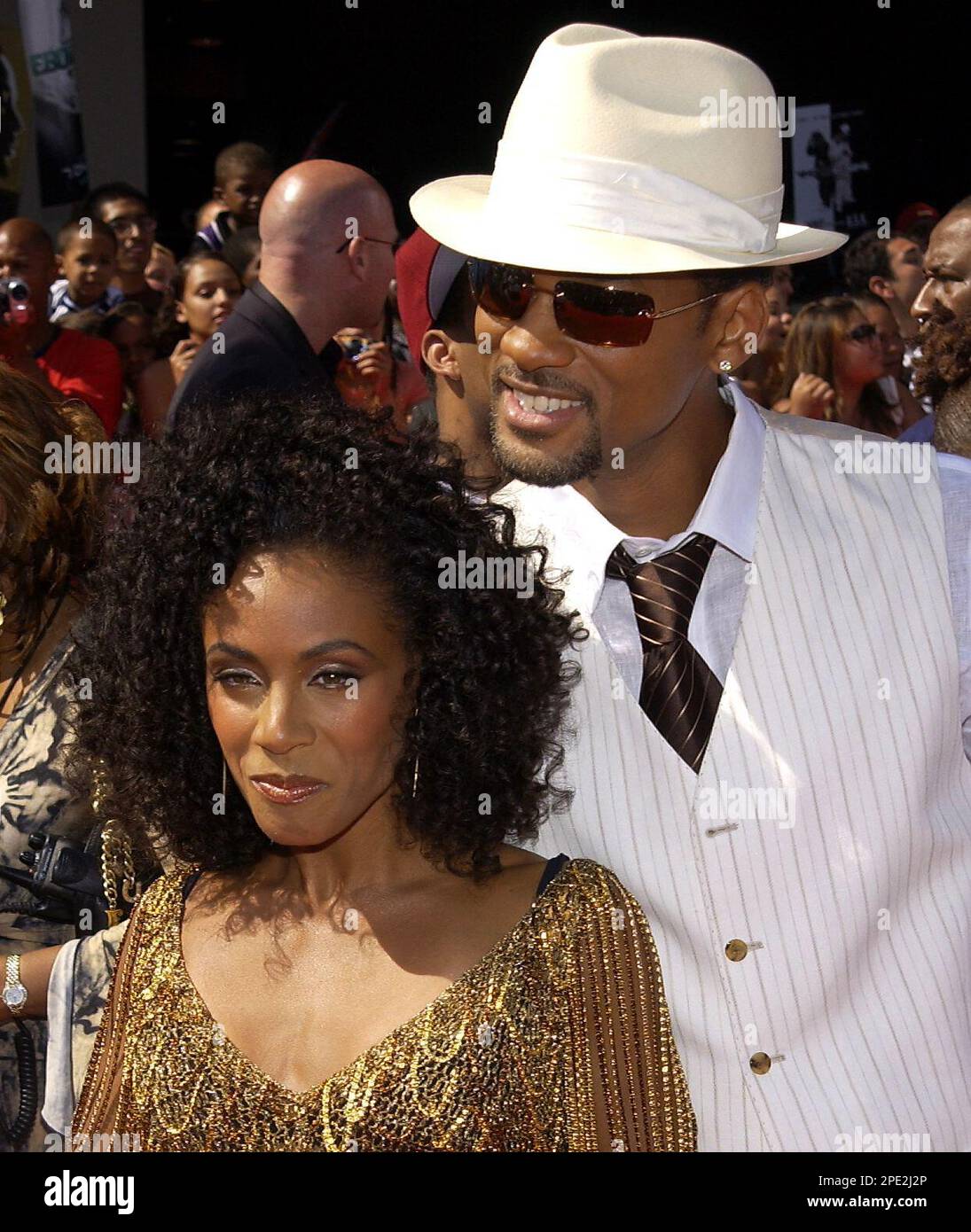 Hosts Will Smith, right, and wife Jada Pinkett Smith arrive for the 5th ...