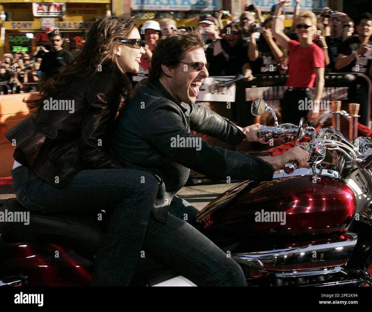 Tom Cruise, star of the new film "War of the Worlds," and fiancee Katie ...