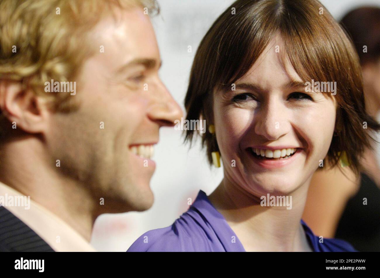 British actress Emily Mortimer, right, shares a laugh with her husband ...