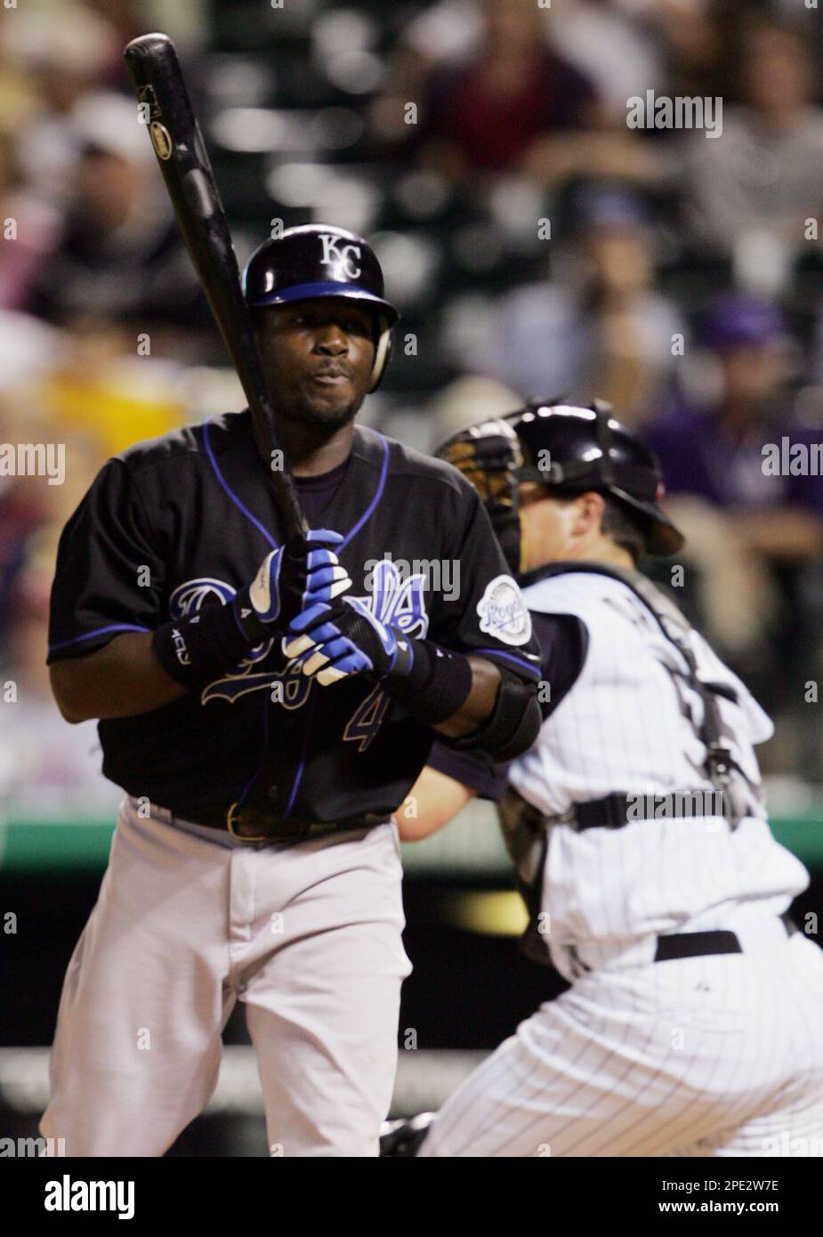 Kansas City Royals' Angel Berroa, left, reacts after striking out ...