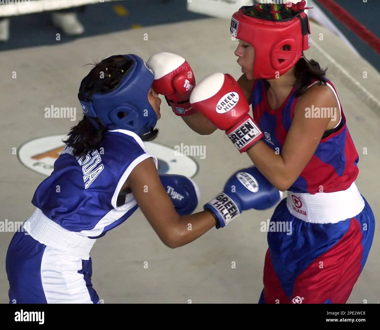 Nicaraguan boxer Lia Santana, left, fights with Irma Hernandez, of El ...