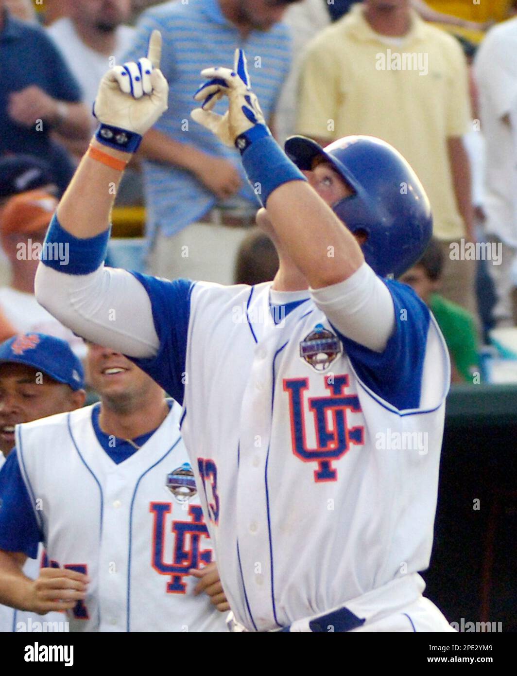 Florida's Matt LaPorta point skyward after he hit a home run against ...