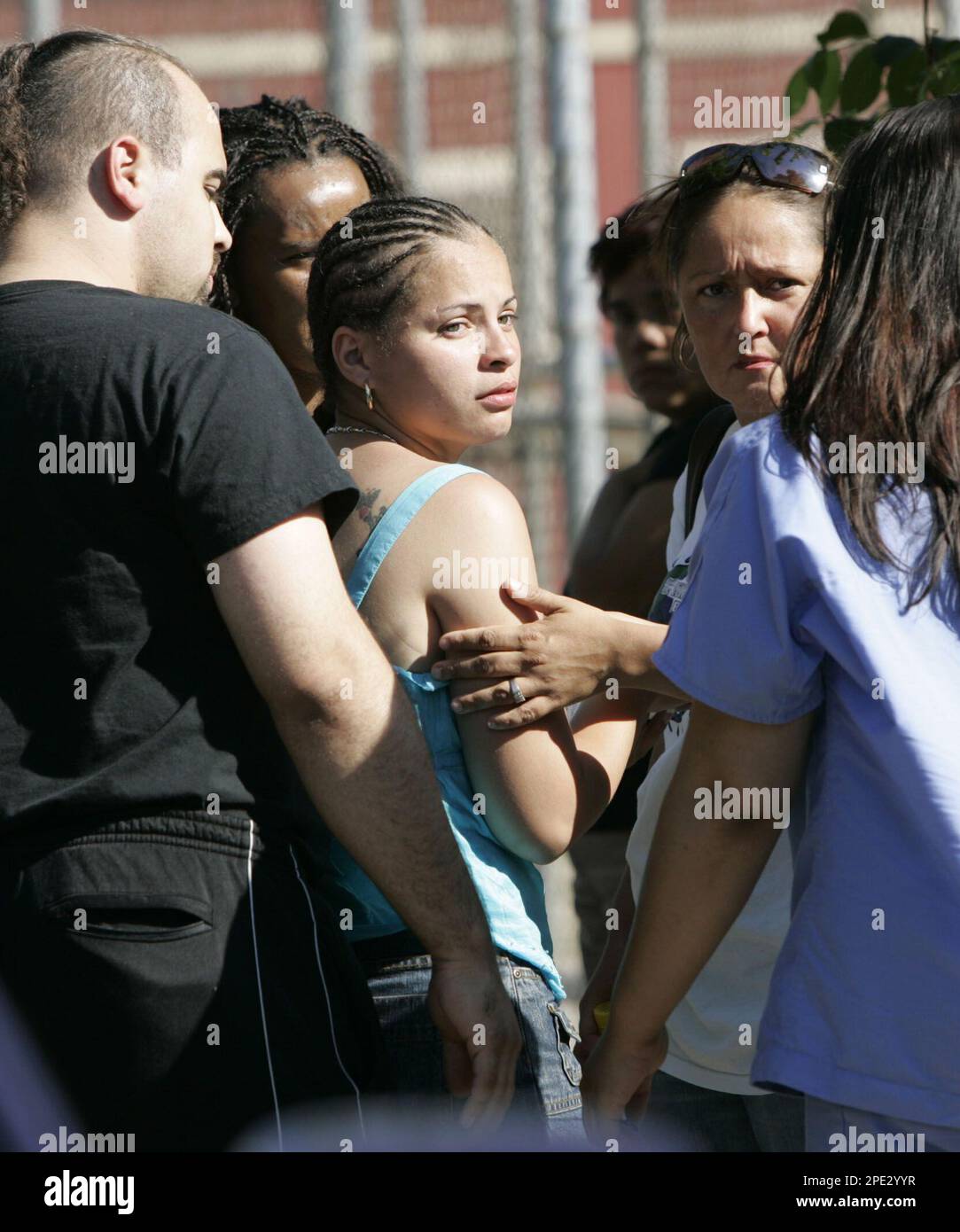 Jessica Pagan, center, mother of Jesstin Pagan, 5, one of the three ...