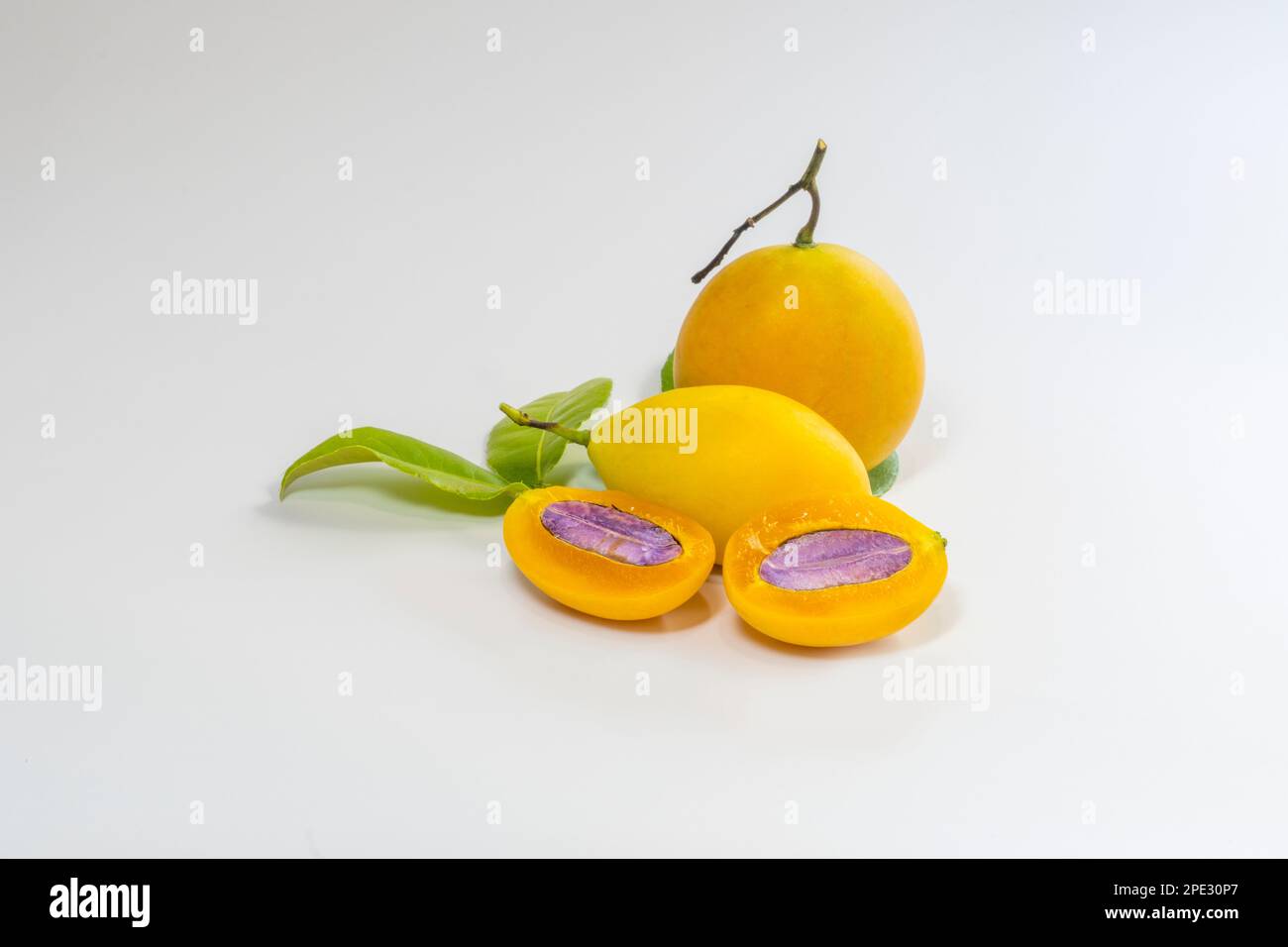 Sweet ripe bouea macrophylla, plum mango pile isolated on white ...