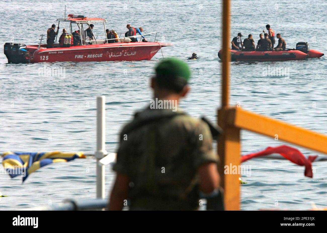 A Lebanese army soldier stands on guard as he watches Lebanese civil ...